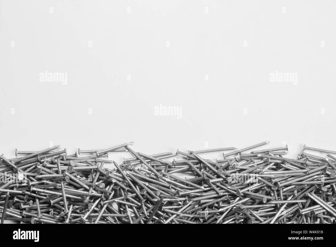 Metal nails isolated on white background Stock Photo - Alamy