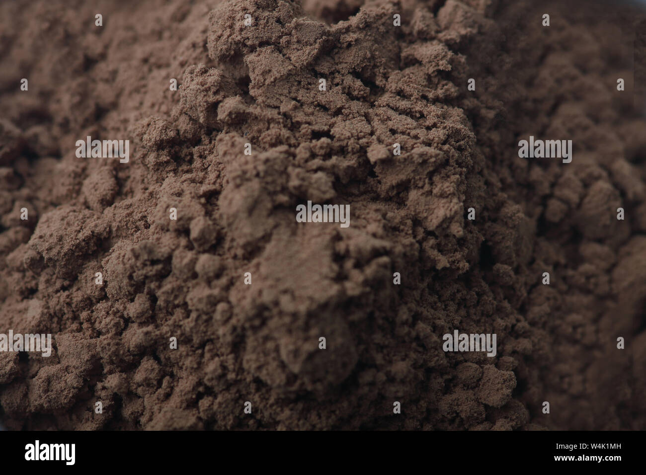cacao powder texture close up. Natural background Stock Photo - Alamy
