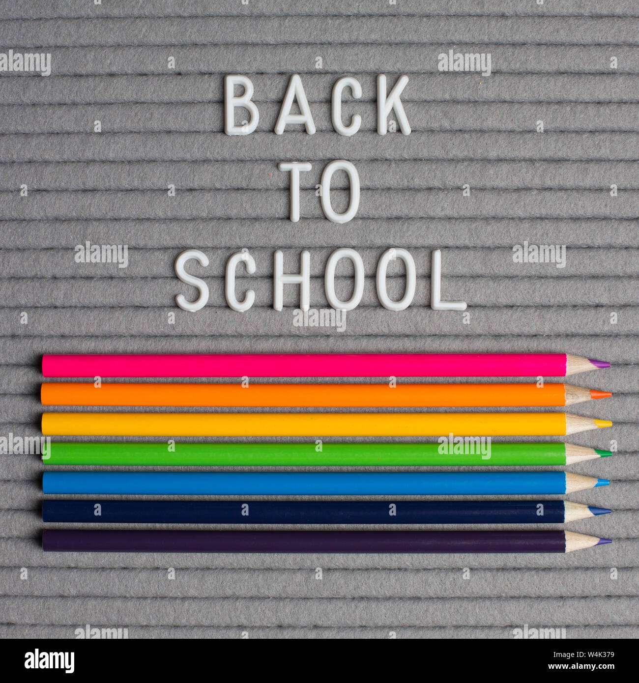 Back to school letter board with colored pencils Stock Photo - Alamy