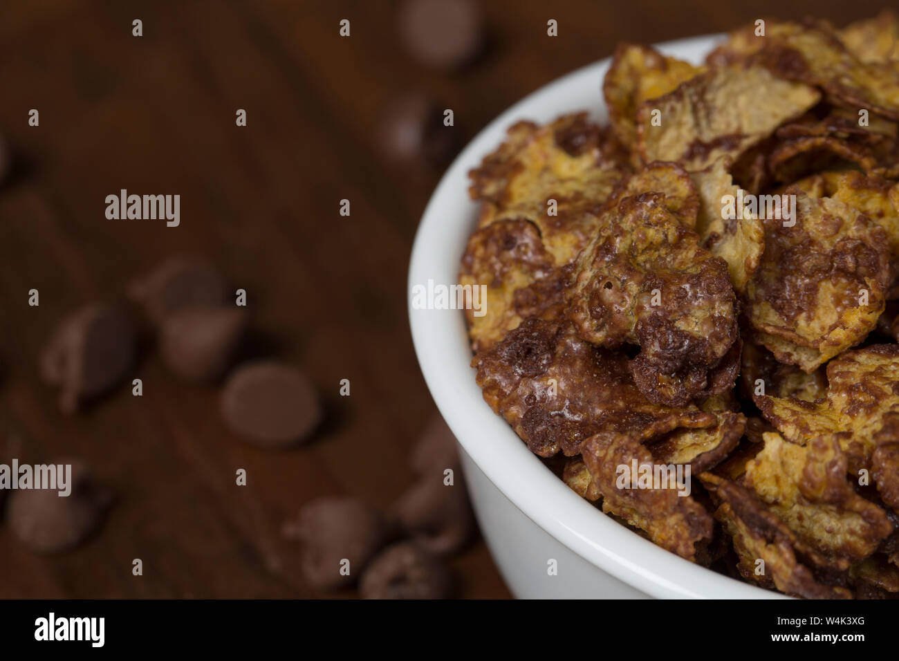 Chocolate flavored flakes of corn cereal Stock Photo - Alamy