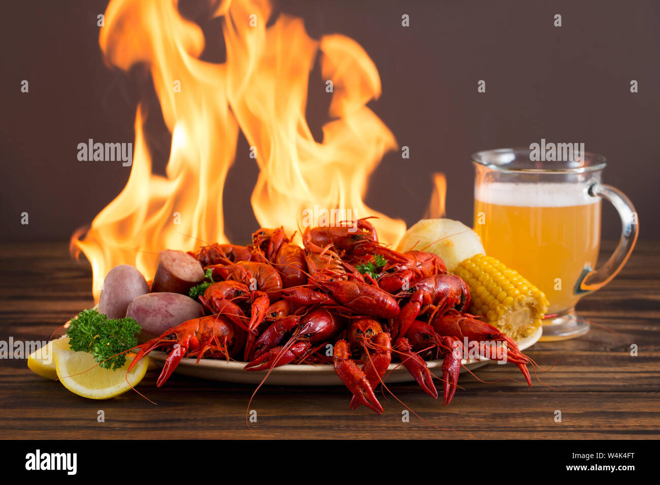 Spicy Boiled Crawfish with Flames Stock Photo - Alamy