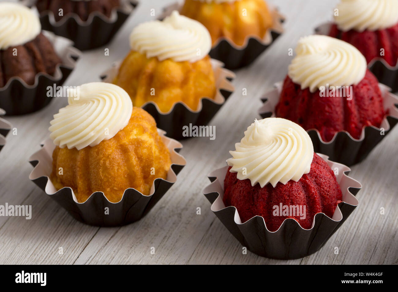Mini Bundt Cakes with Cream Cheese Icing Stock Photo - Alamy