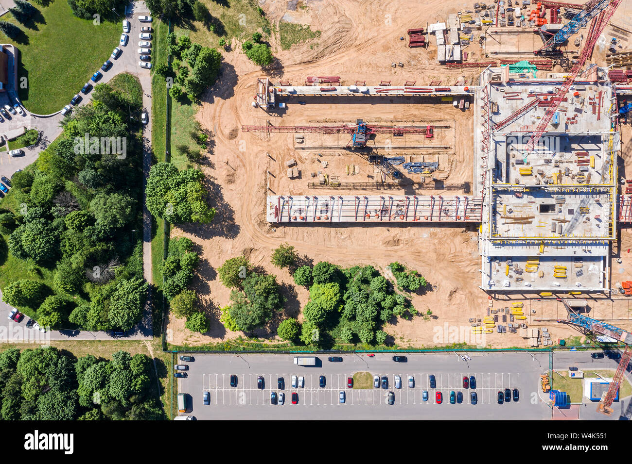 aerial top view of city construction site with industrial and building ...