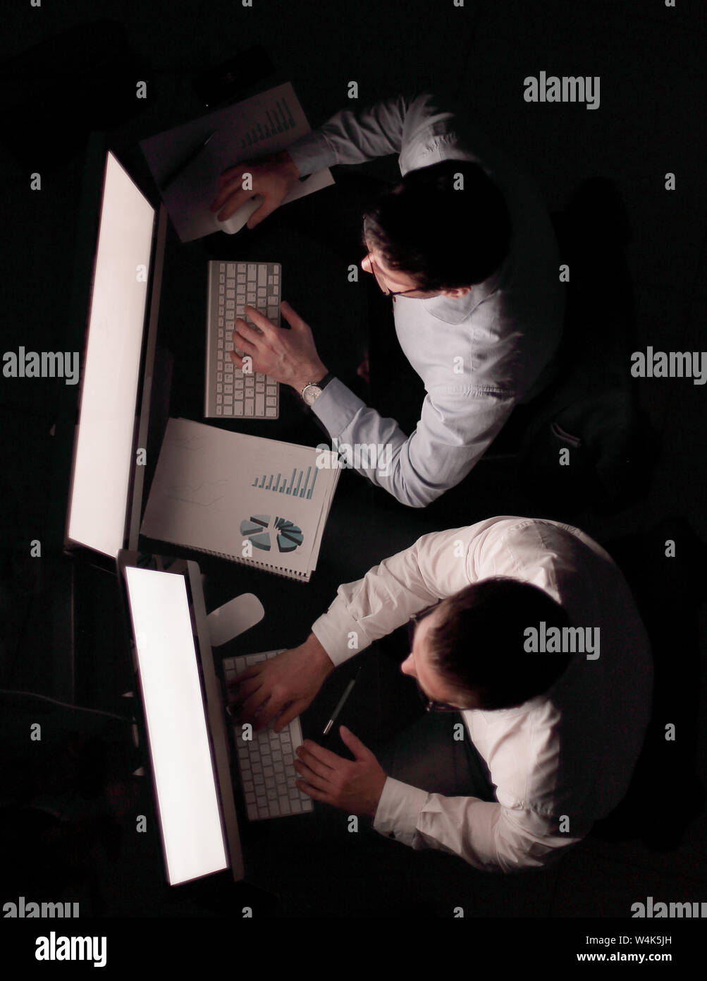 Colleagues making analysis finance hi-res stock photography and images ...