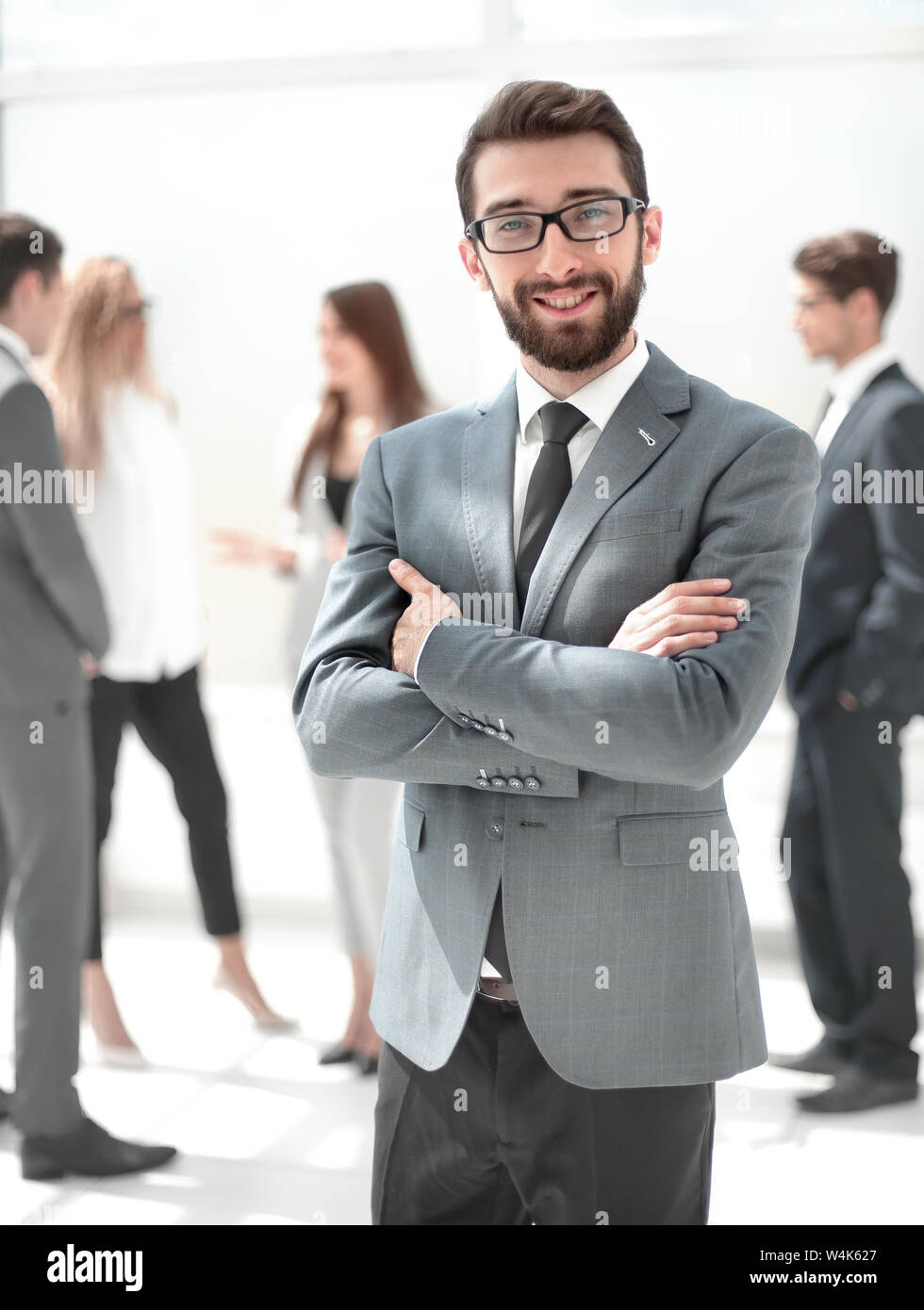 modern business man standing in the office Stock Photo - Alamy