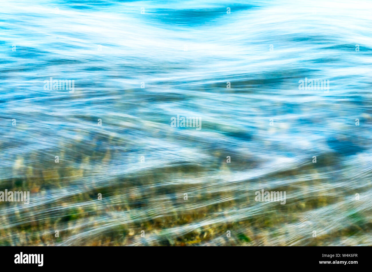 Blurred Waves Ripples over Riverbed or Seabed Stock Photo - Alamy