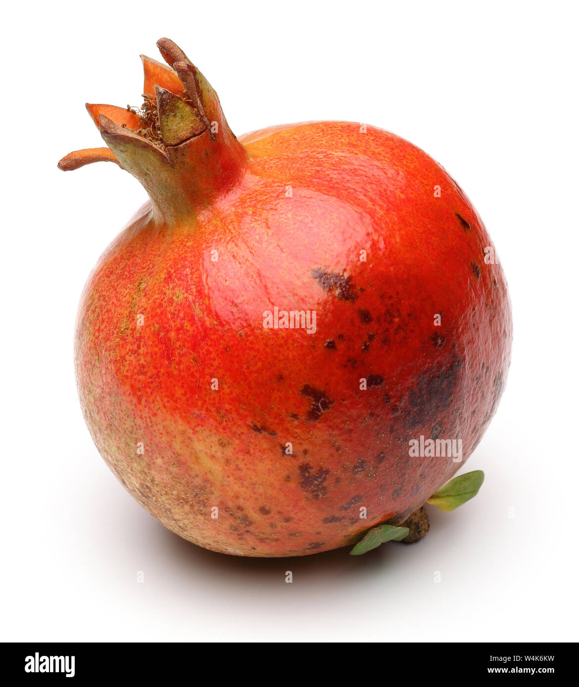 Whole pomegranate fruit isolated on white background Stock Photo - Alamy