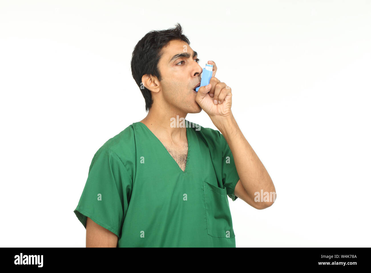 Patient using asthma inhaler Stock Photo - Alamy