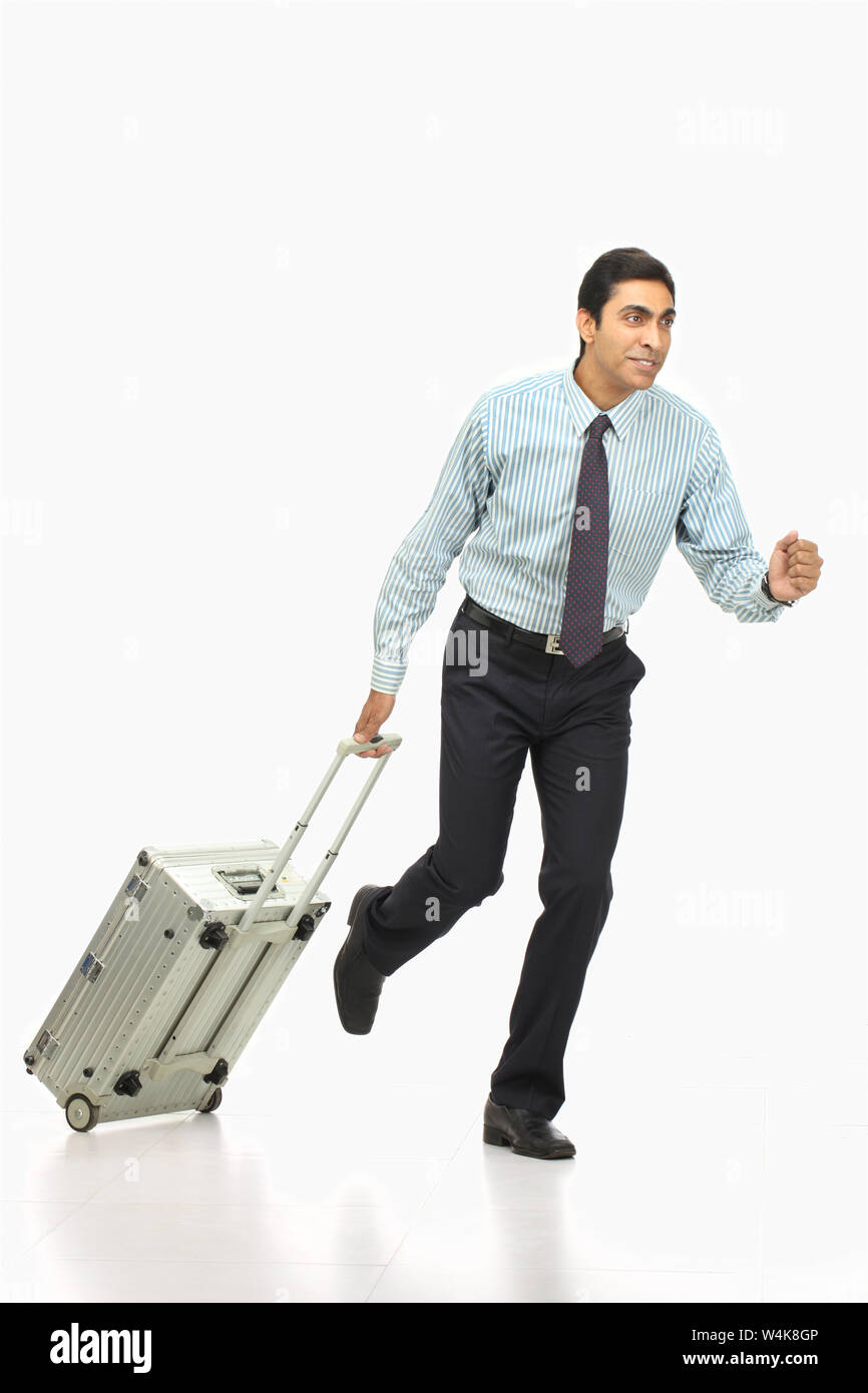Running business traveller hi-res stock photography and images - Alamy