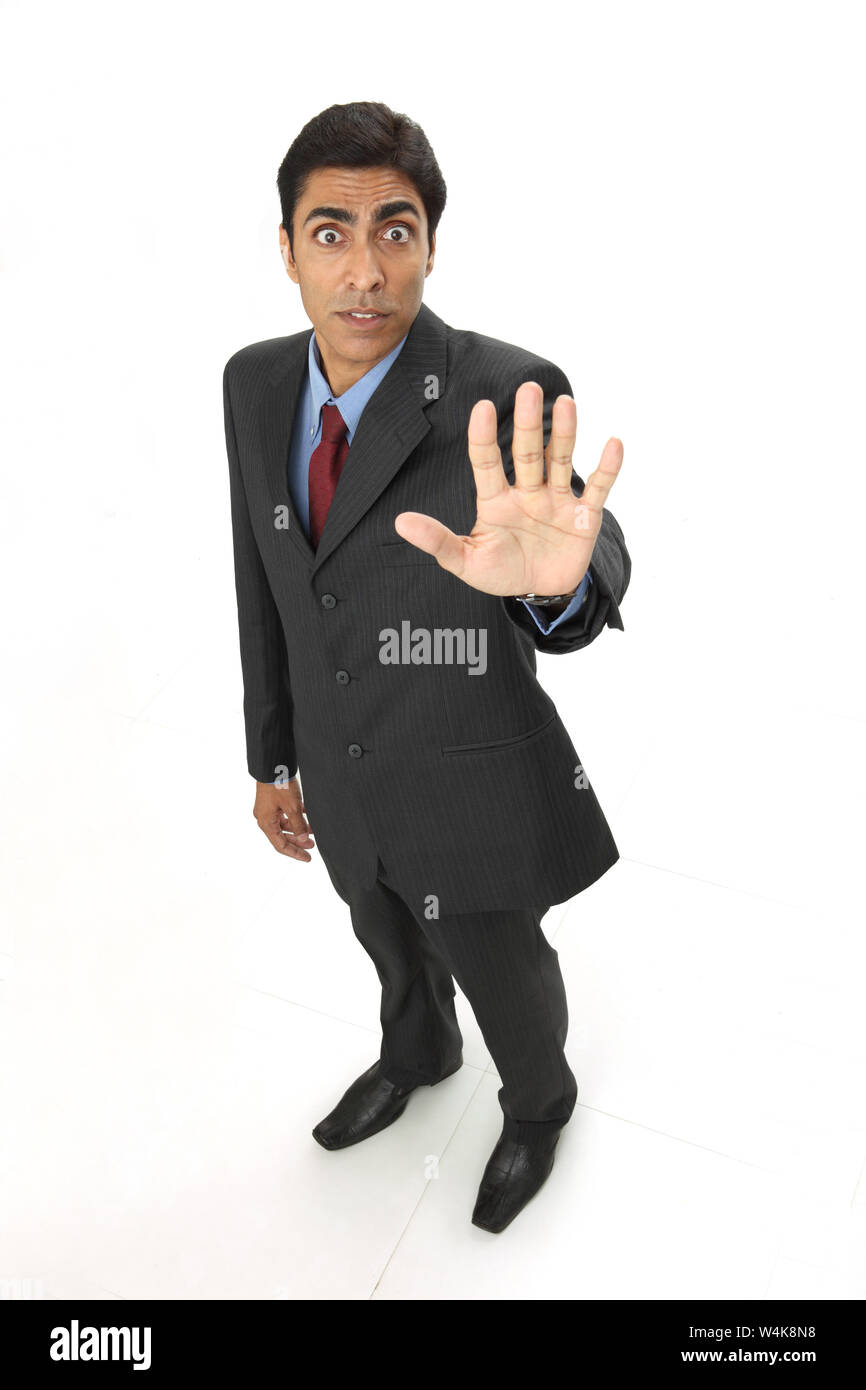 Indian businessman making stop gesture sign Stock Photo - Alamy