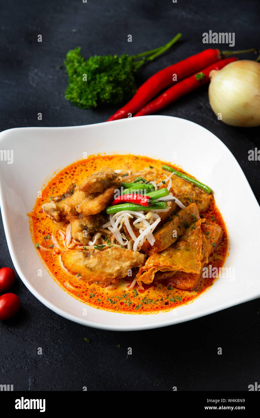 curry noodle with dark background and settings Stock Photo - Alamy