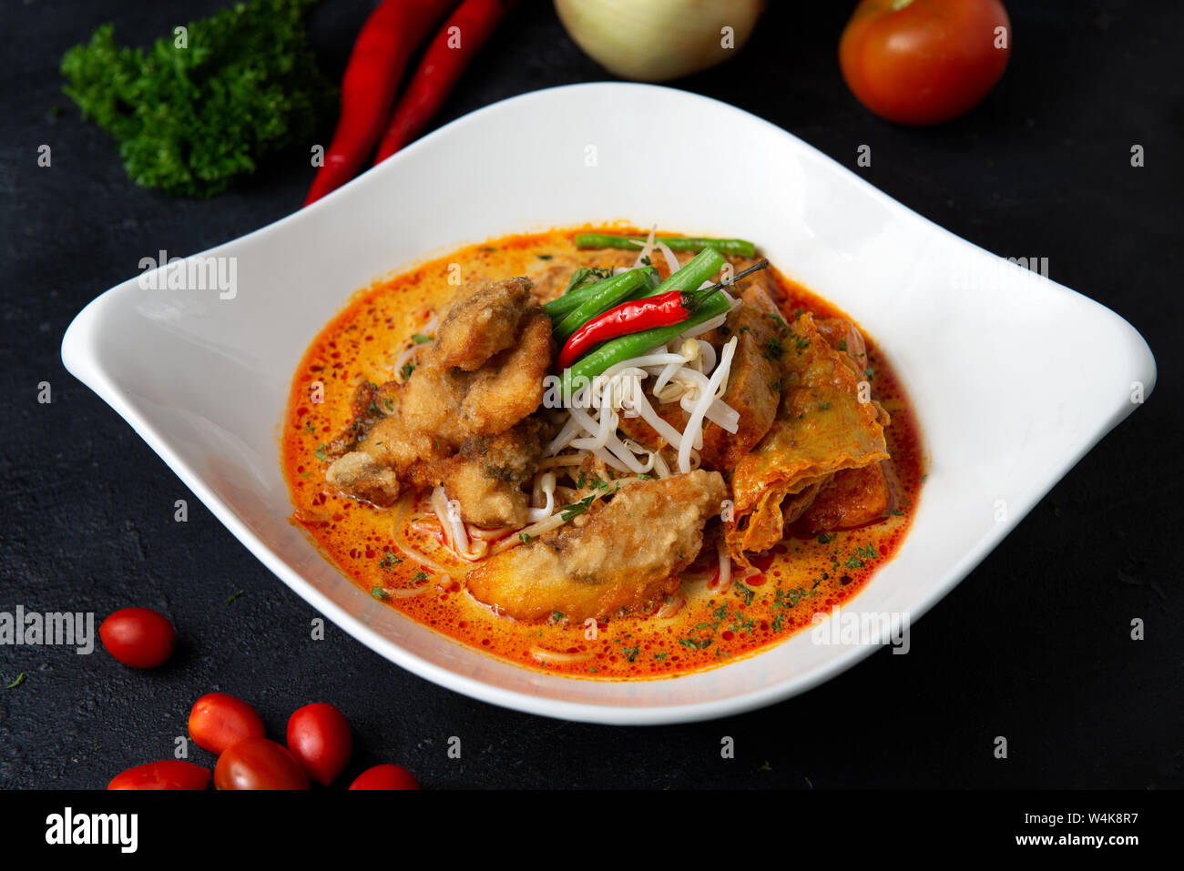 curry noodle with dark background and settings Stock Photo - Alamy