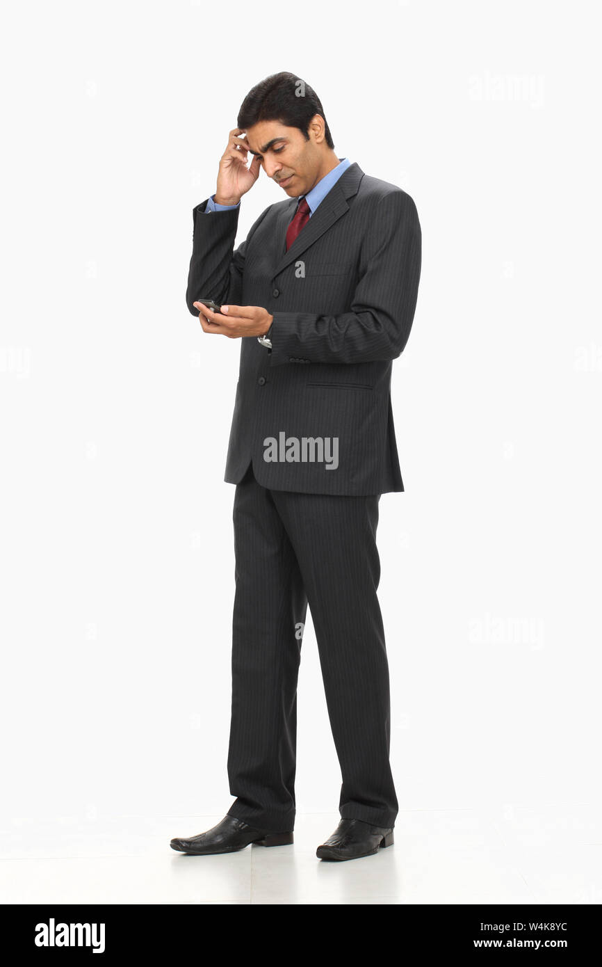 Office worker scratching head hi-res stock photography and images - Alamy