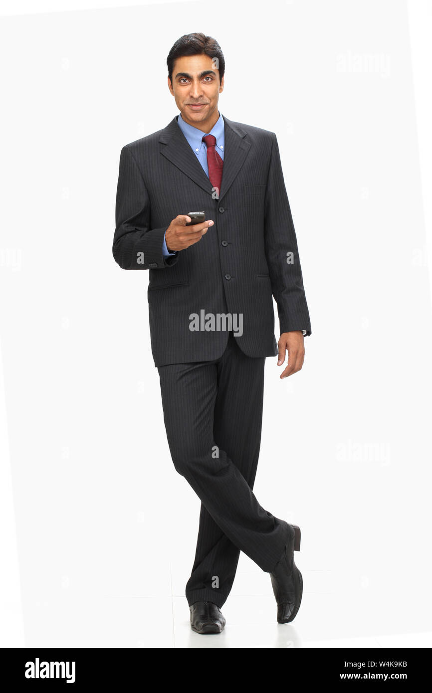 Businessman text messaging Stock Photo - Alamy