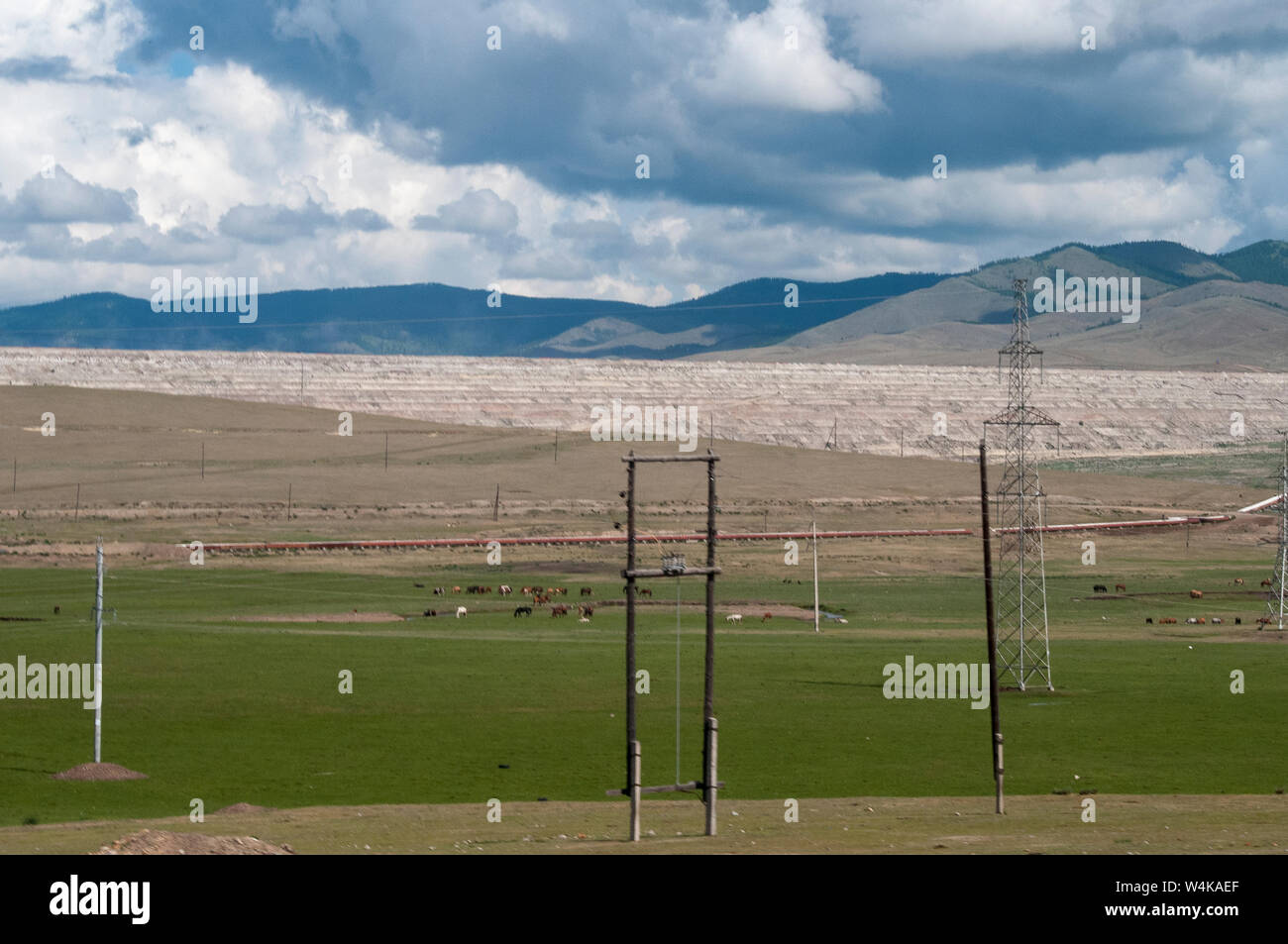 Pit wall of the open-cut Erdenet copper /molybdenum mine, northern ...