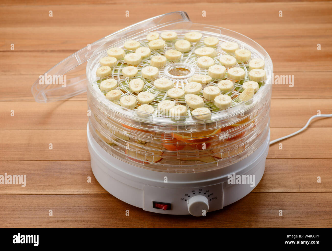 Multi-rack dehydrator with various fruits Stock Photo - Alamy