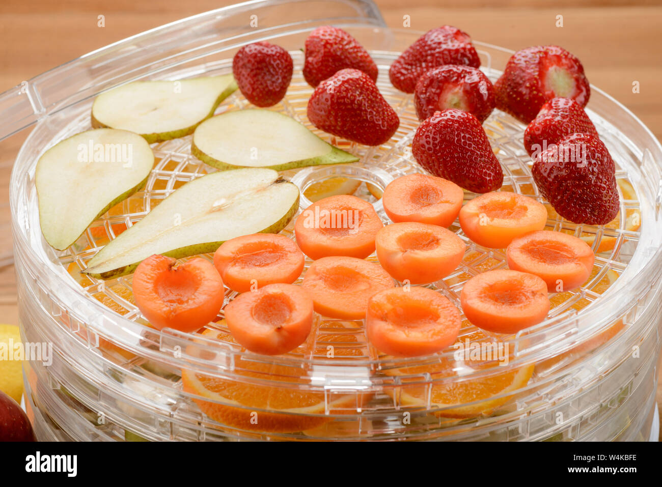 Various fruits being dried Stock Photo - Alamy