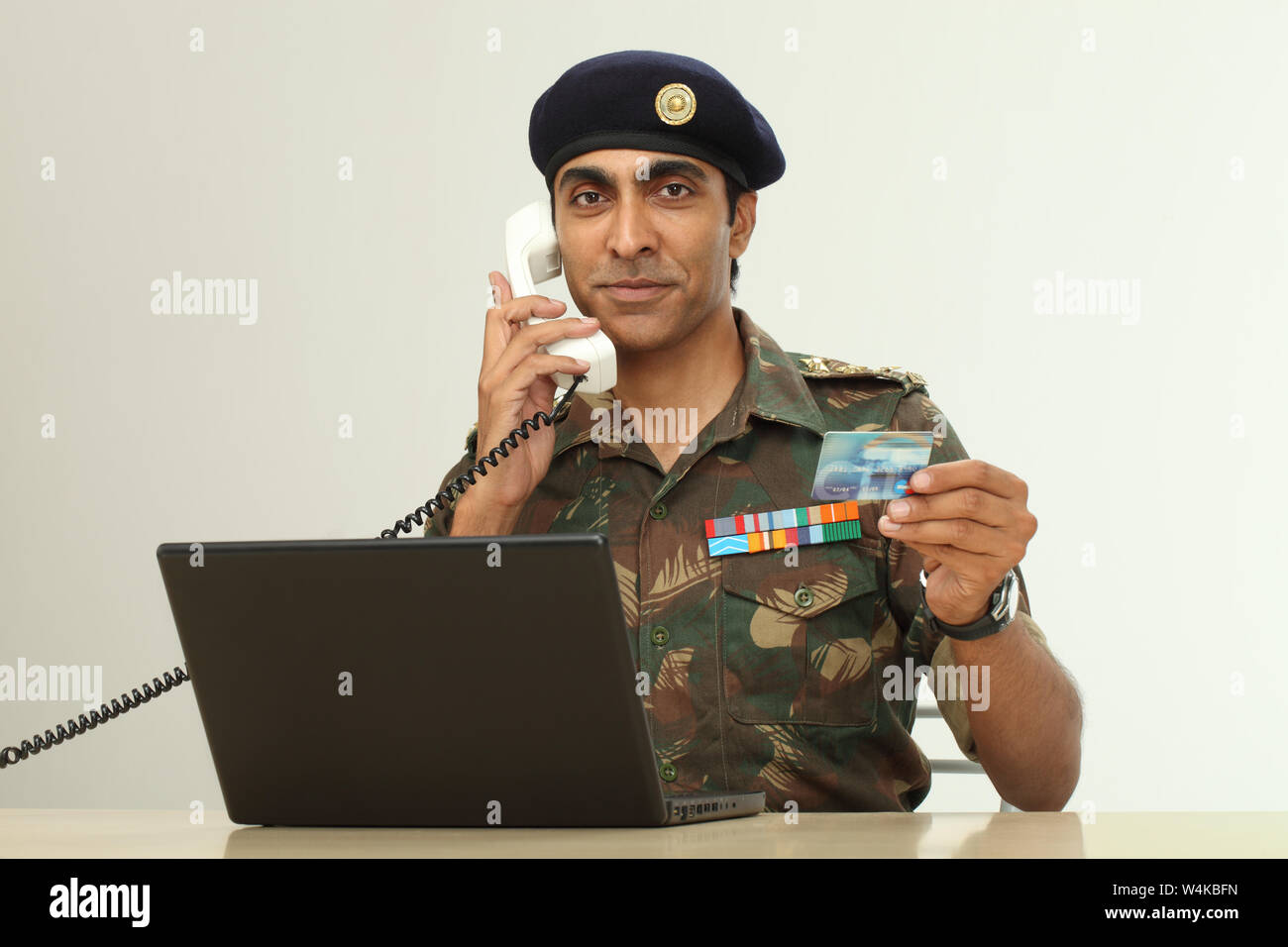 Indian army soldier talking on hi-res stock photography and images - Alamy