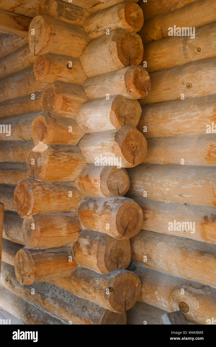 Old-fashioned traditional construction of joining logs in a wooden ...