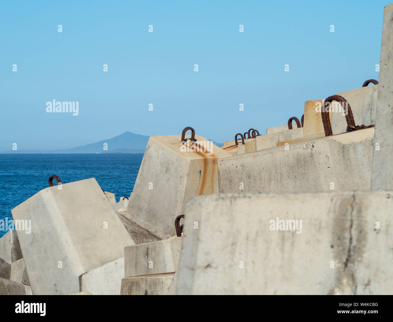 Concrete blocks that create the break wall Stock Photo - Alamy