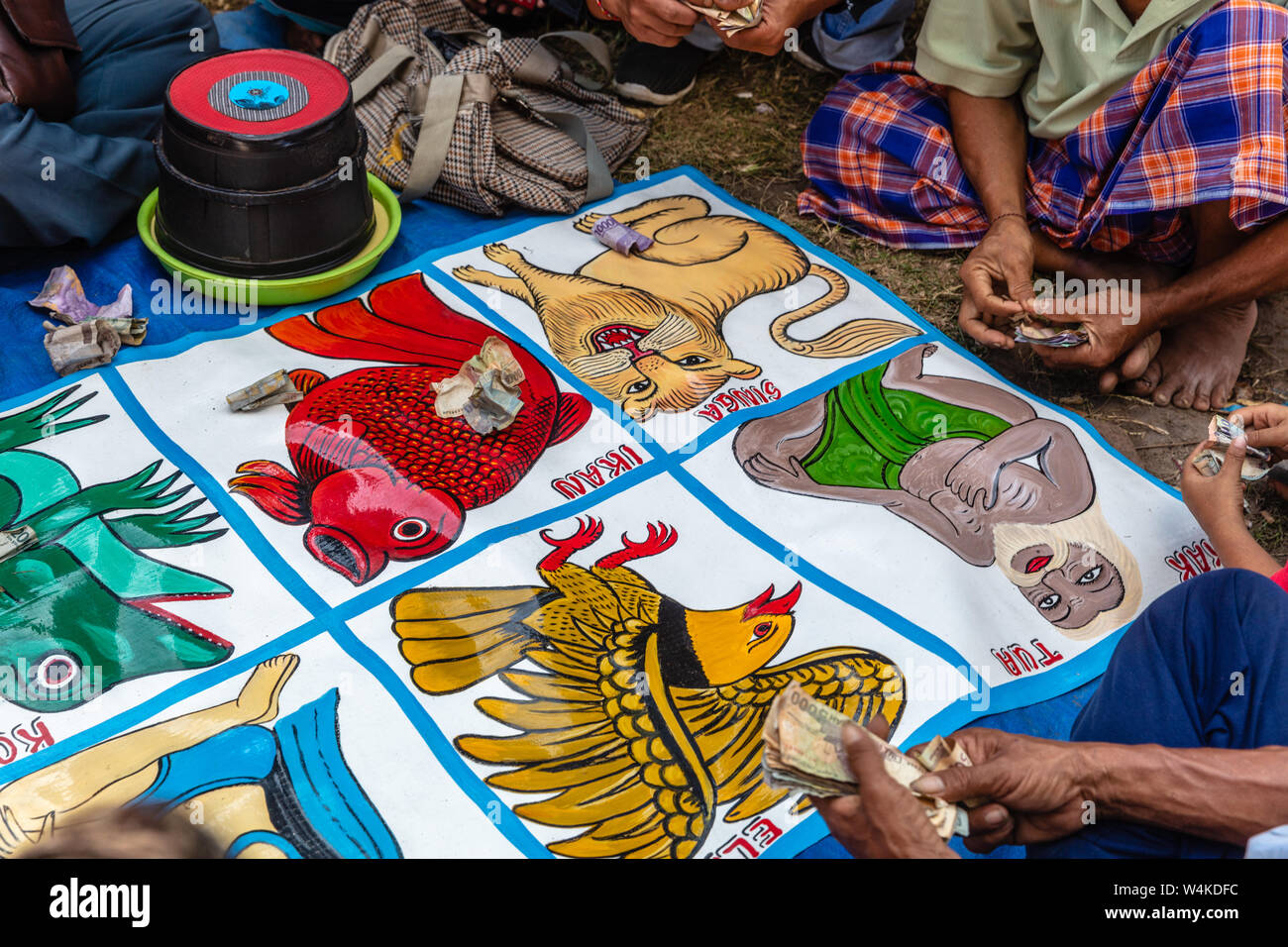 Balinese traditional street gambling, the game called kocok or mong ...