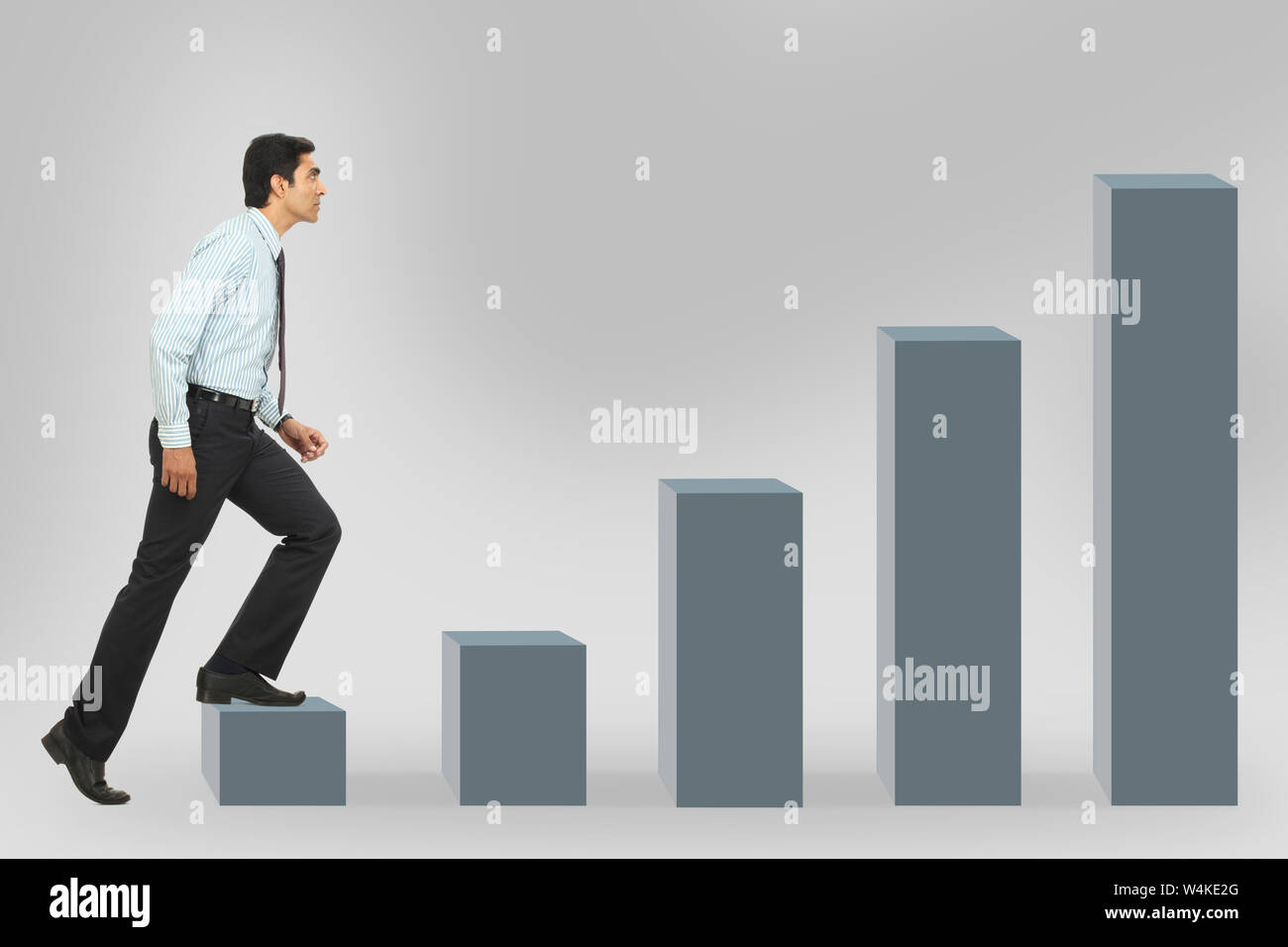 Man climbing bar chart hi-res stock photography and images - Alamy