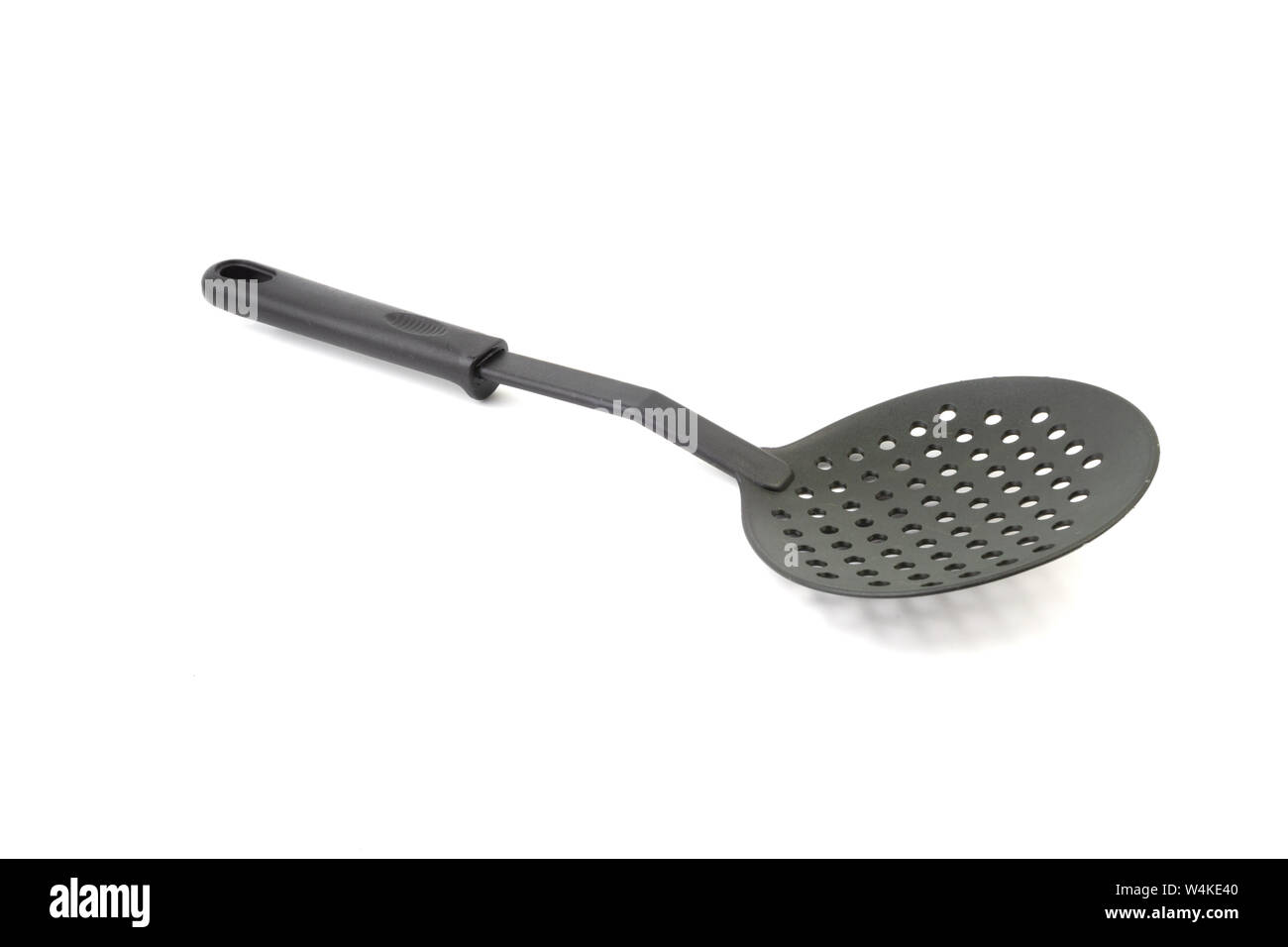 Black kitchen spatula utensils or kitchenware closeup isolated on white ...