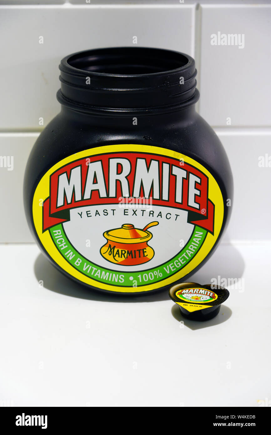 LONDON, ENGLAND -3 APR 2019- View of a jar of Marmite, a traditional ...