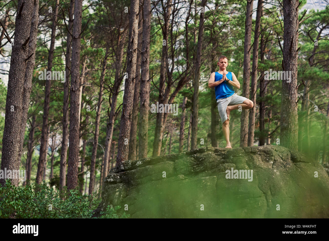 Yoga pose in a forest hi-res stock photography and images - Alamy