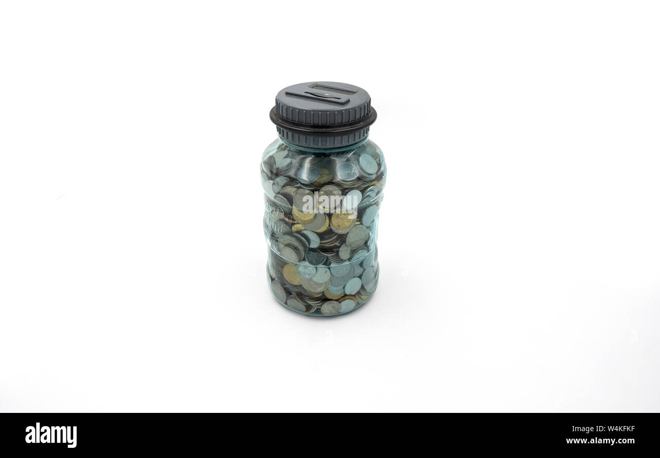 Transparent see thru coins saving box piggy bank isolated on white ...