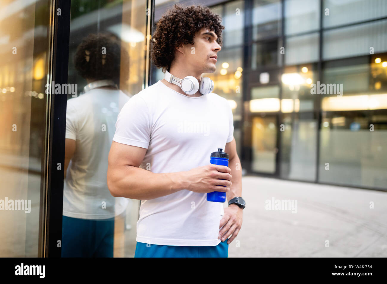 Happy sporty fit man running to stay healthy outdoor Stock Photo - Alamy