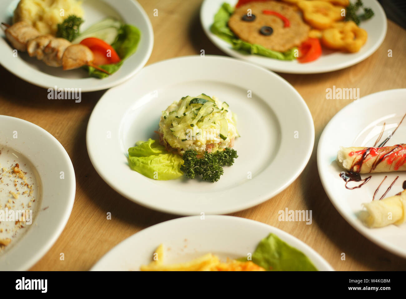 lot of delicious dishes on the table of the restaurant Stock Photo - Alamy