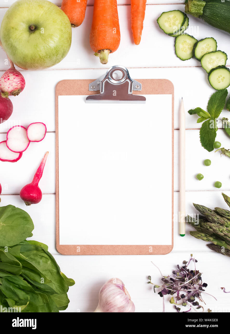 Meal plan of menu concept. Empty paper mock-up in the cener of ...