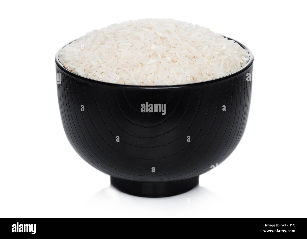 Black bowl of raw organic basmati rice on white background Stock Photo ...