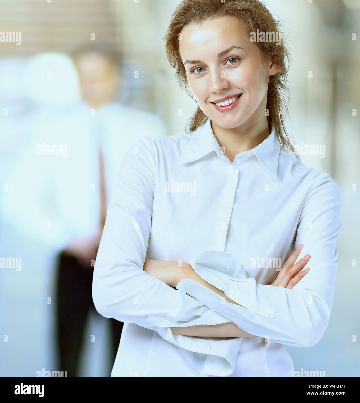 Business lady with positive look and cheerful smile posing for the ...