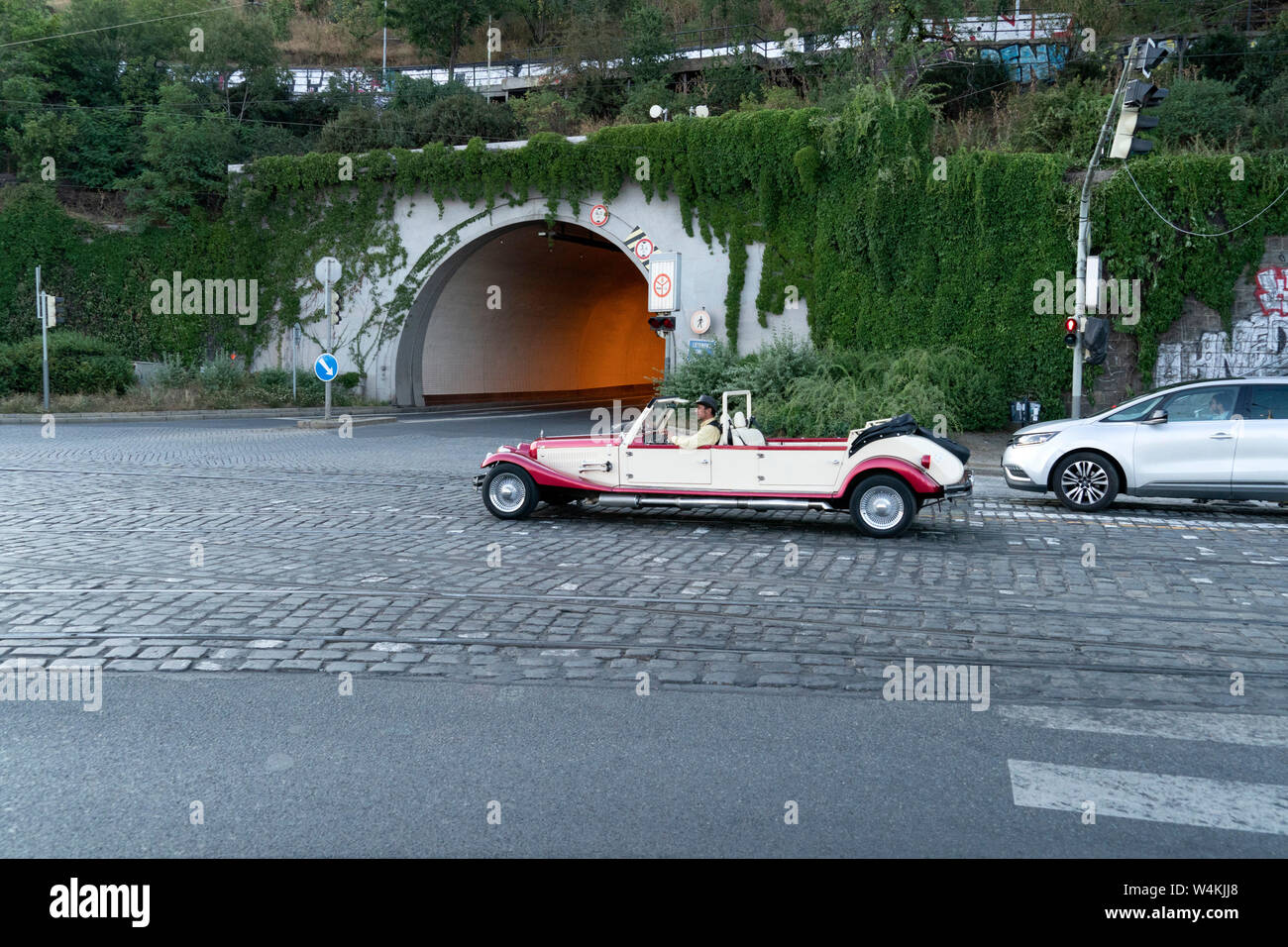 PRAGUE, CZECH REPUBLIC - JULY 15 2019 - Old style cars in Medieval town ...