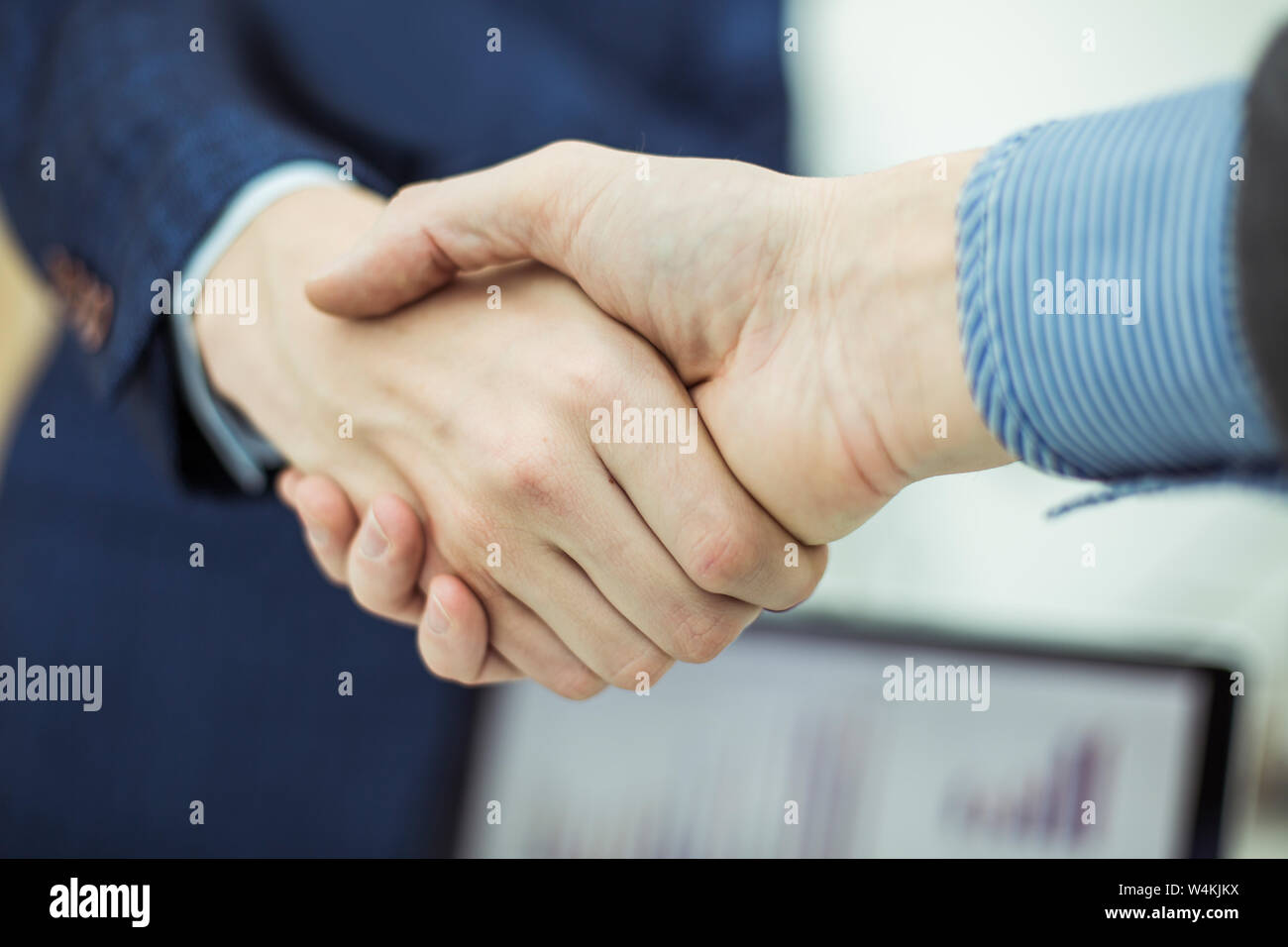 closeup of handshake of business partners in the office Stock Photo - Alamy