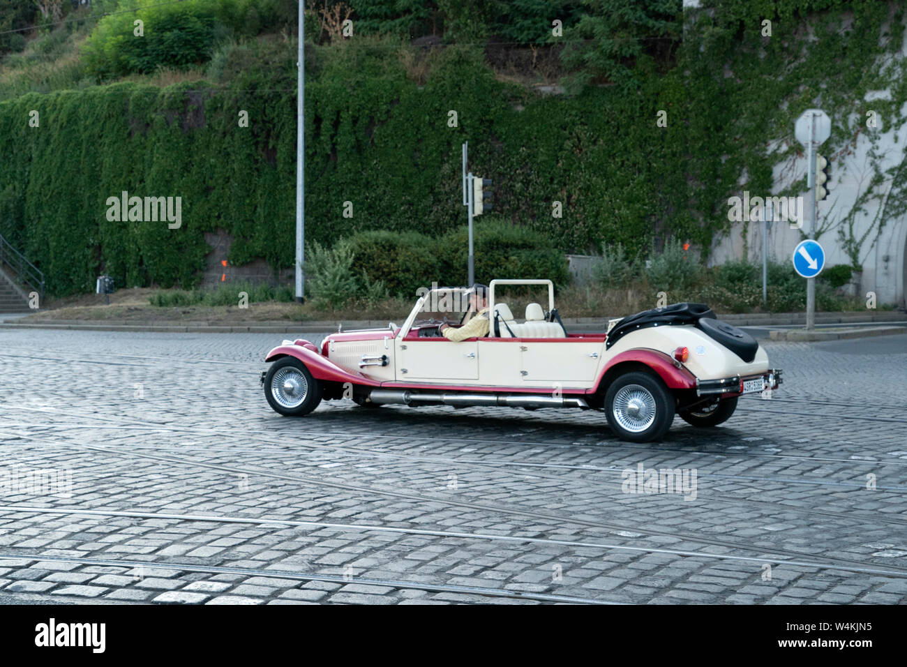 PRAGUE, CZECH REPUBLIC - JULY 15 2019 - Old style cars in Medieval town ...