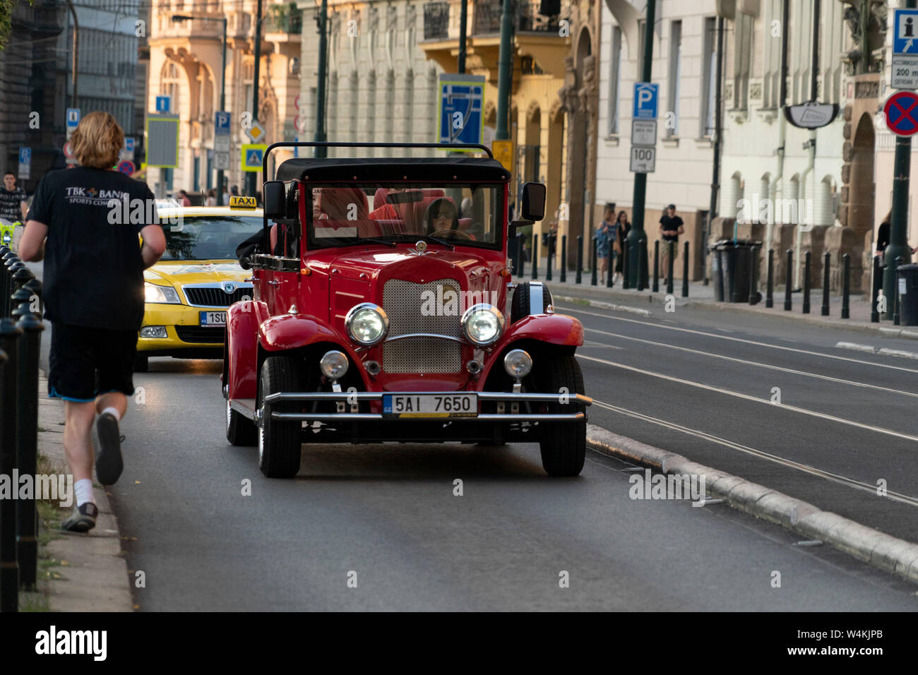 PRAGUE, CZECH REPUBLIC - JULY 15 2019 - Old style cars in Medieval town ...