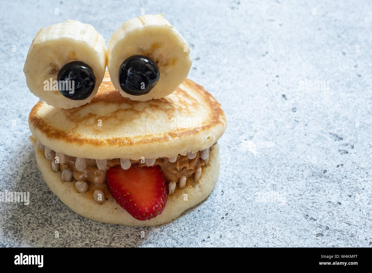 Cute pancake monster Stock Photo - Alamy