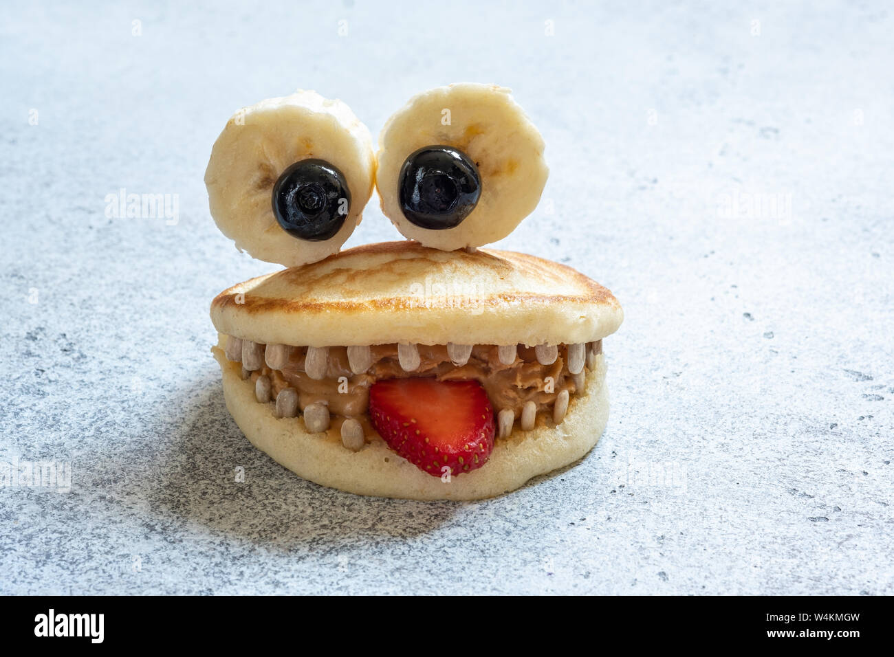 Cute pancake monster Stock Photo - Alamy