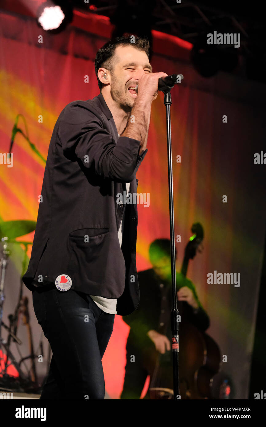 Felix Riebl of The Cat Empire performing at The Larmer Tree Festival ...