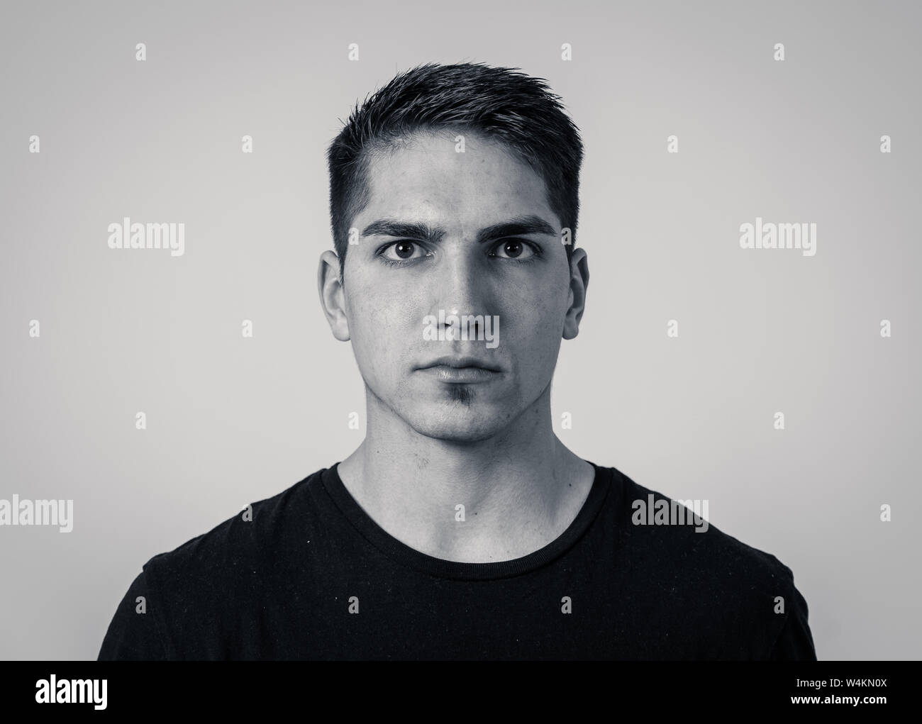 Portrait of young attractive frustrated mixed race man with angry face ...