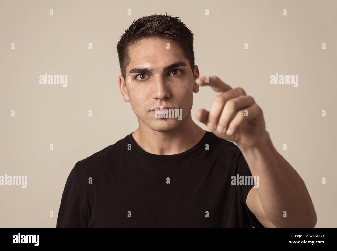 Portrait of young attractive frustrated mixed race man with angry face ...