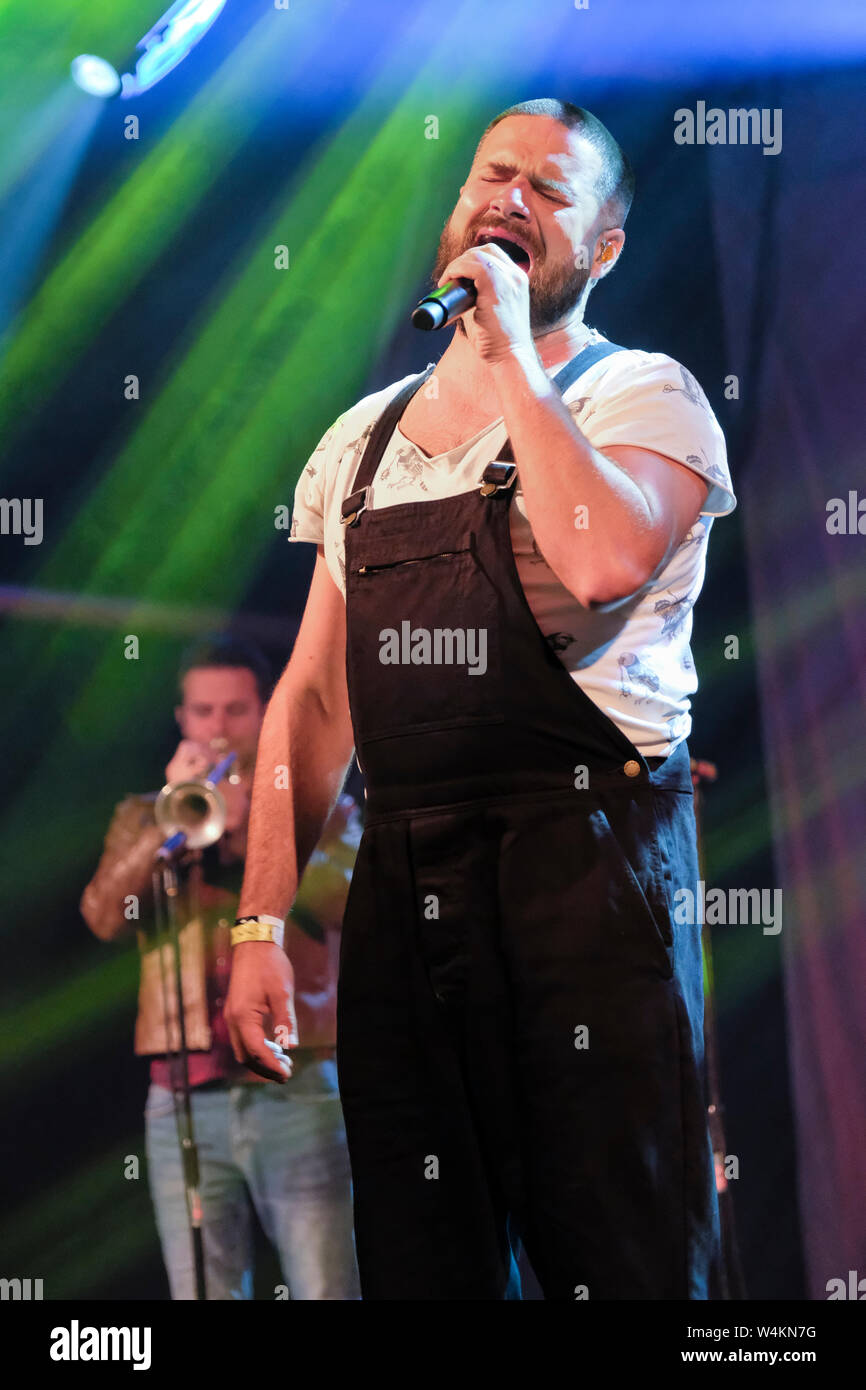 Harry James Angus of The Cat Empire performing at The Larmer Tree ...