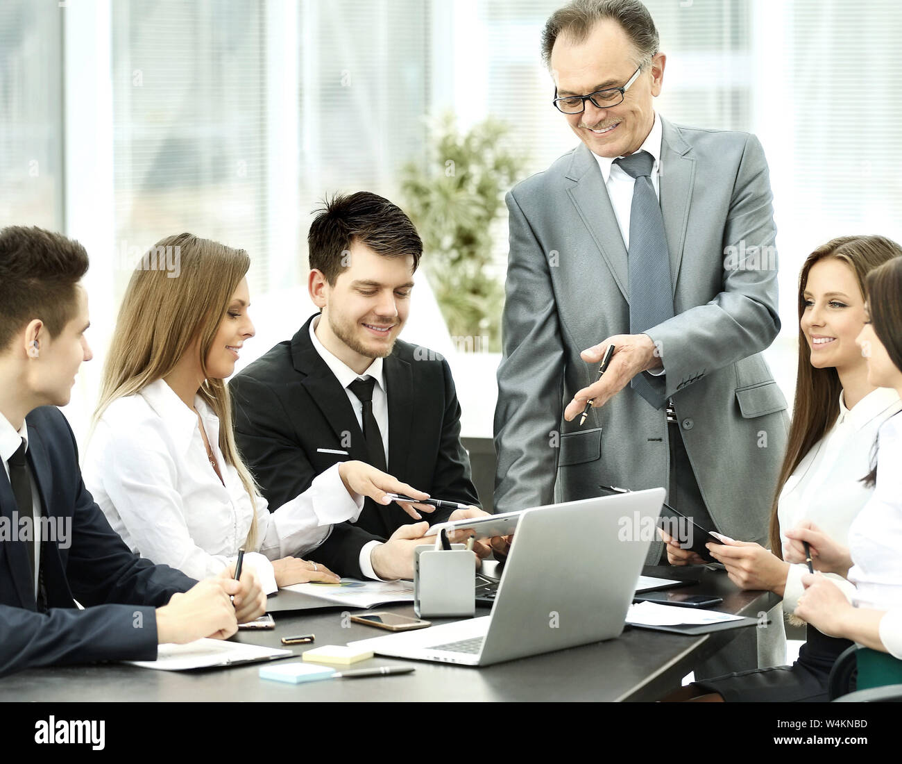 successful businessman and business team at a seminar in modern office ...