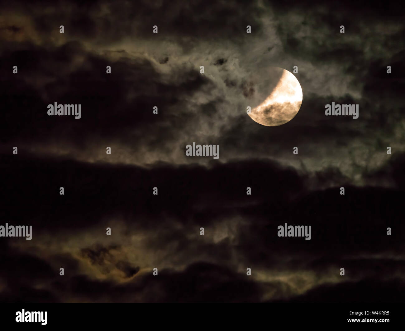 Cloudy moonlit night sky hi-res stock photography and images - Alamy