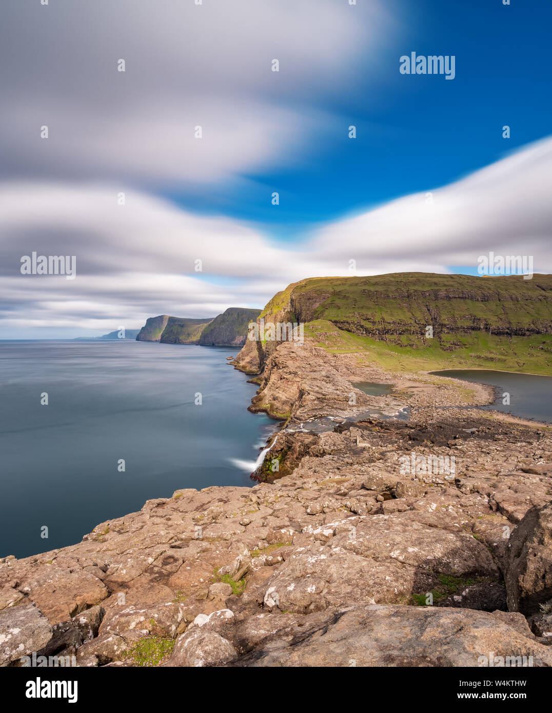 Bosdalafossur waterfall vertical composition ultra long exposure, Faroe ...