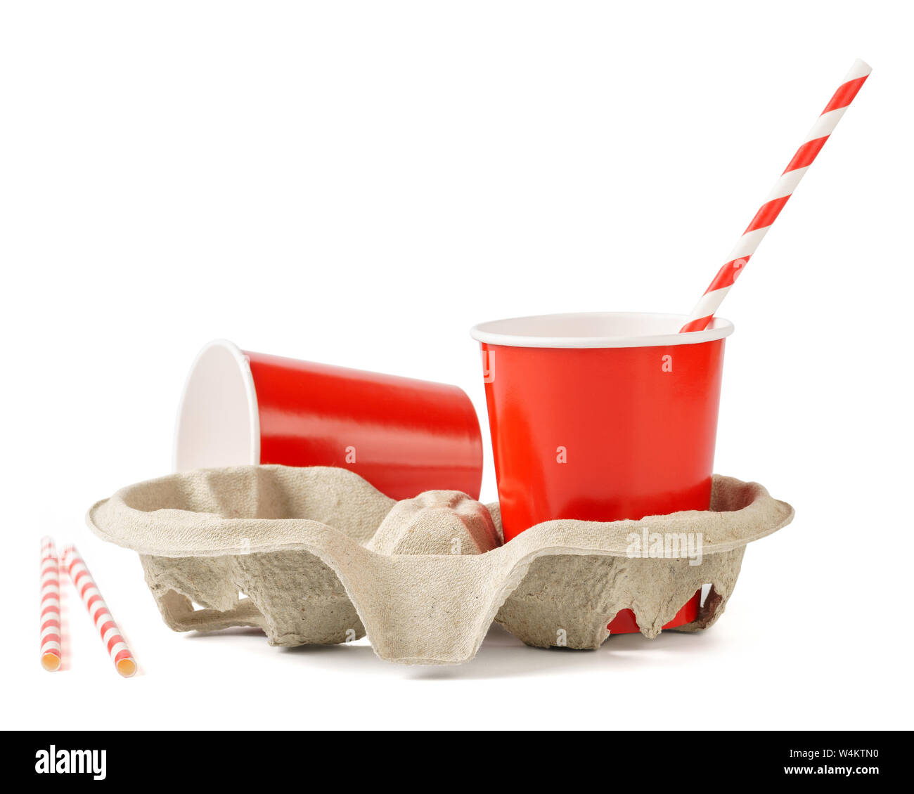 Red disposable paper cups with a cup holder and straws. Isolated on a ...