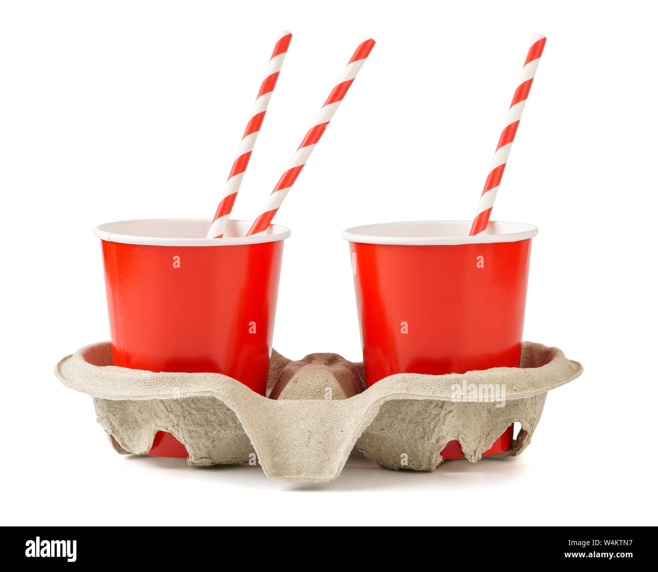 Red disposable paper cups with a cup carrier and straws. Isolated on a ...